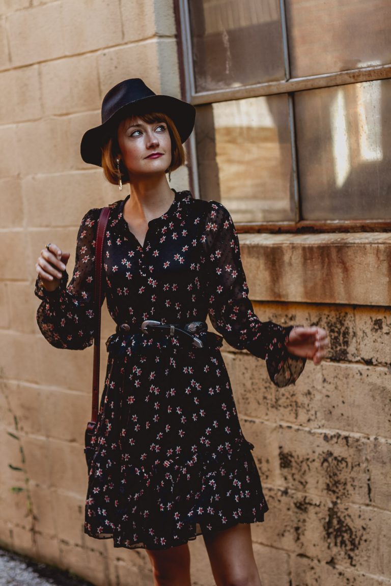 bringing western goth to a frilly dress - District of Chic